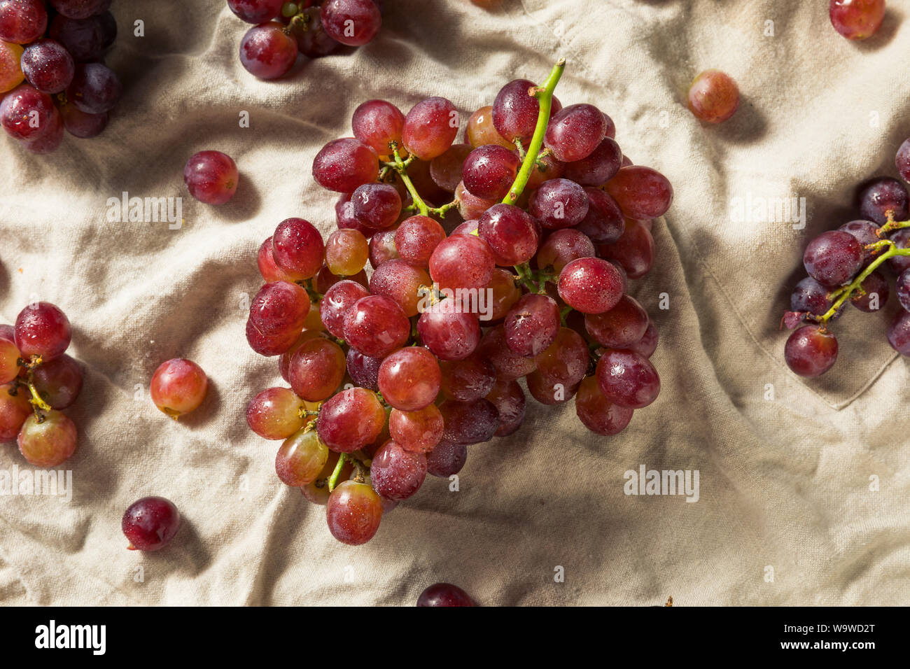 Raw Red Organic Grapes in a Cluster Stock Photo - Alamy