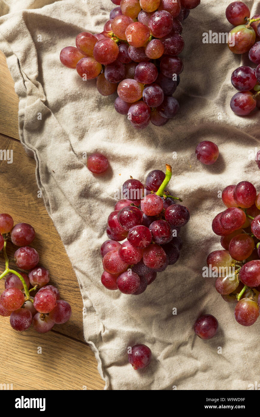 Raw Red Organic Grapes in a Cluster Stock Photo - Alamy