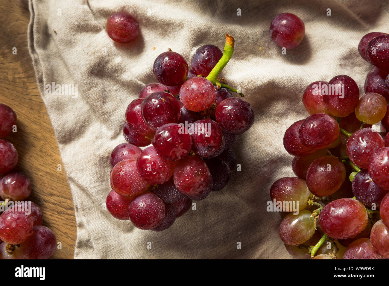 Raw Red Organic Grapes in a Cluster Stock Photo - Alamy