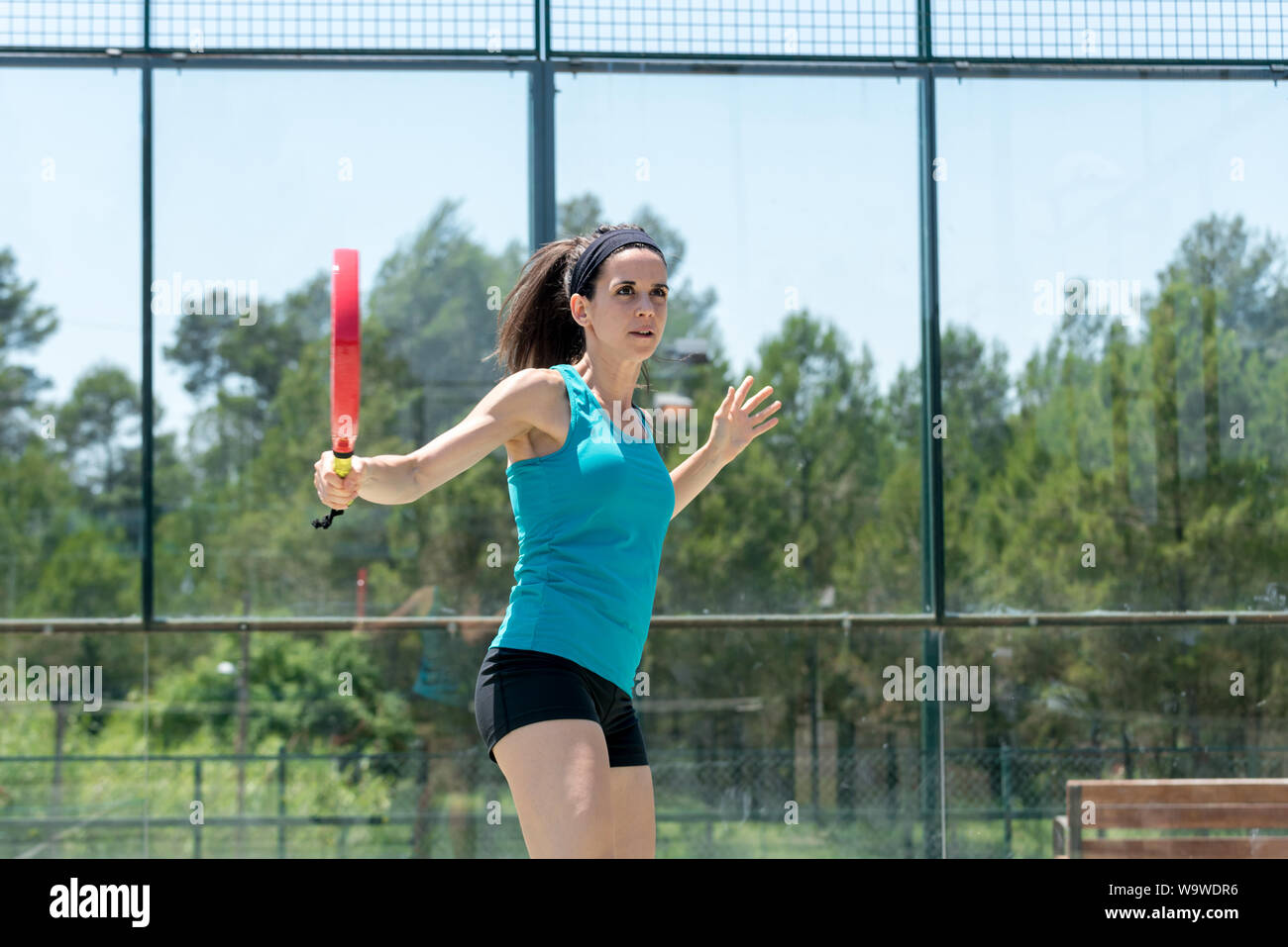 Woman playing padel outdoor Stock Photo - Alamy