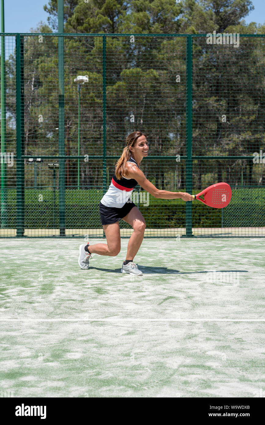 Woman playing padel outdoor Stock Photo - Alamy