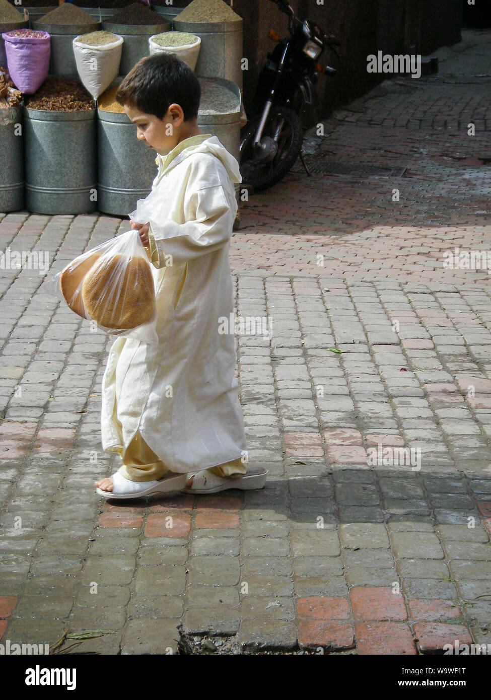 Marrakesh, Maroc April 02,2010: young Moroccan boy in white traditional ...