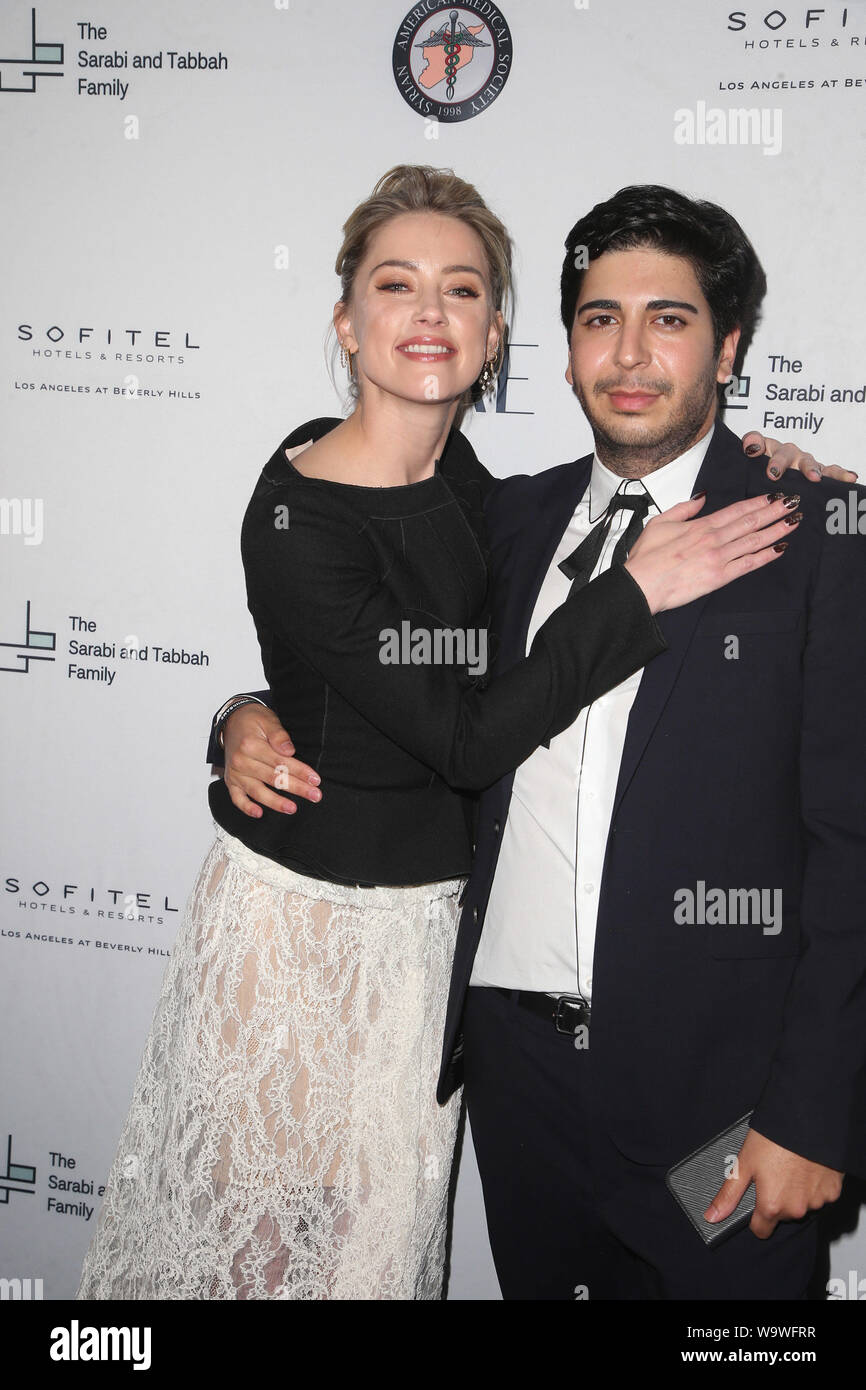 Los Angeles.CA.USA. Amber Heard and Rami Sarabi at the Syrian American ...
