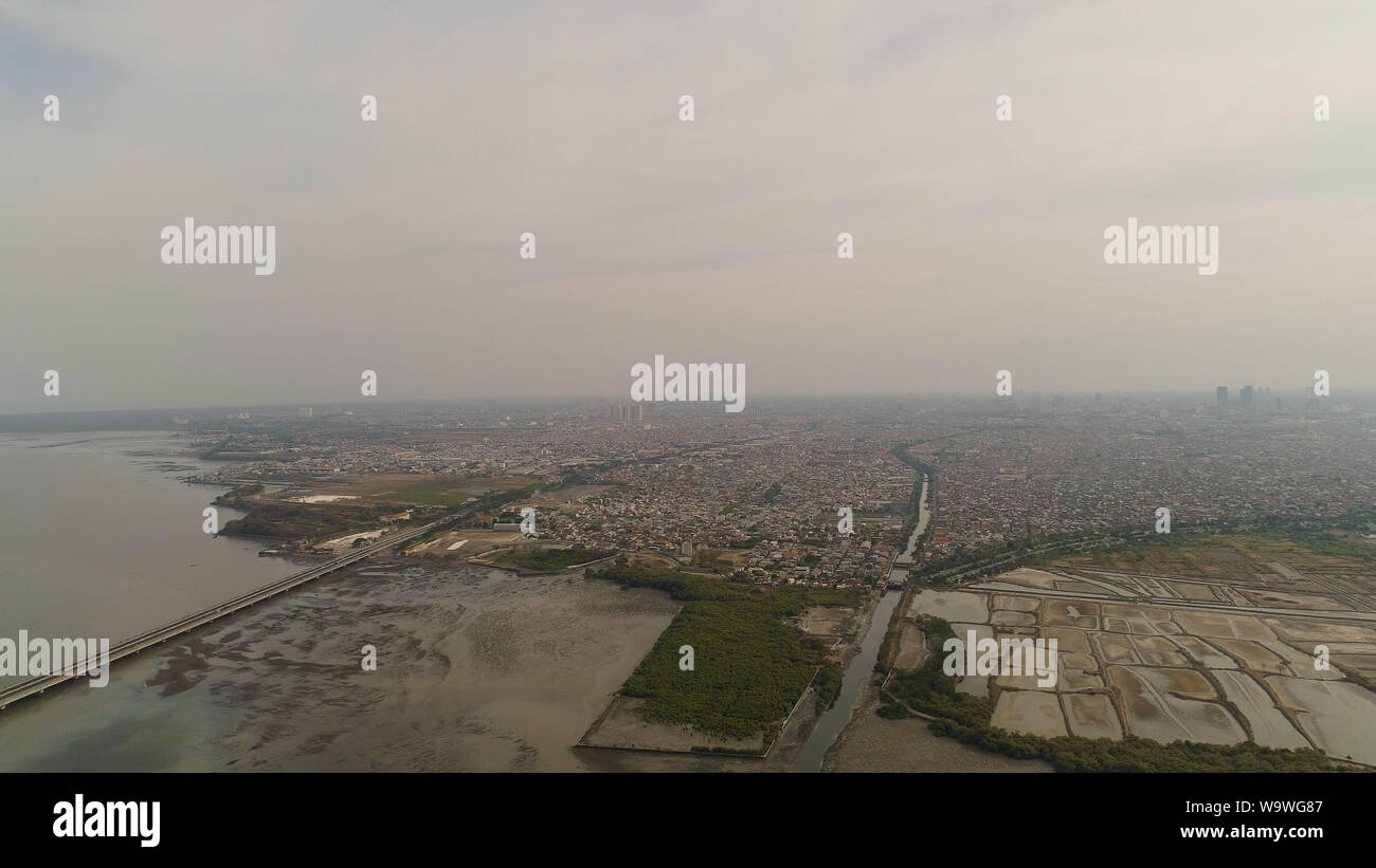 Aerial cityscape modern city Surabaya with skyscrapers, buildings and ...