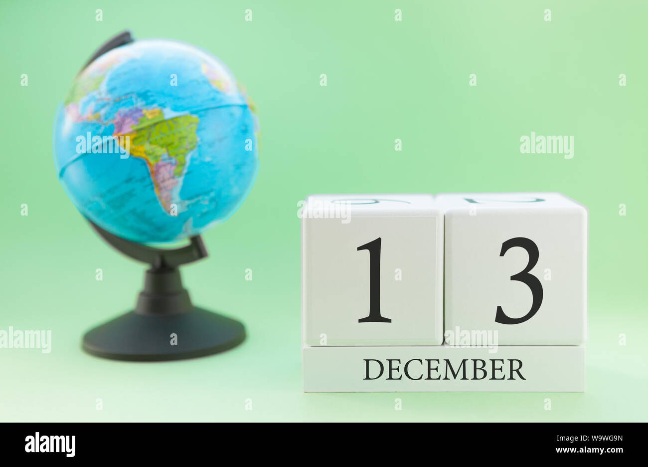 Planner wooden cube with numbers, 13 day of the month of December ...