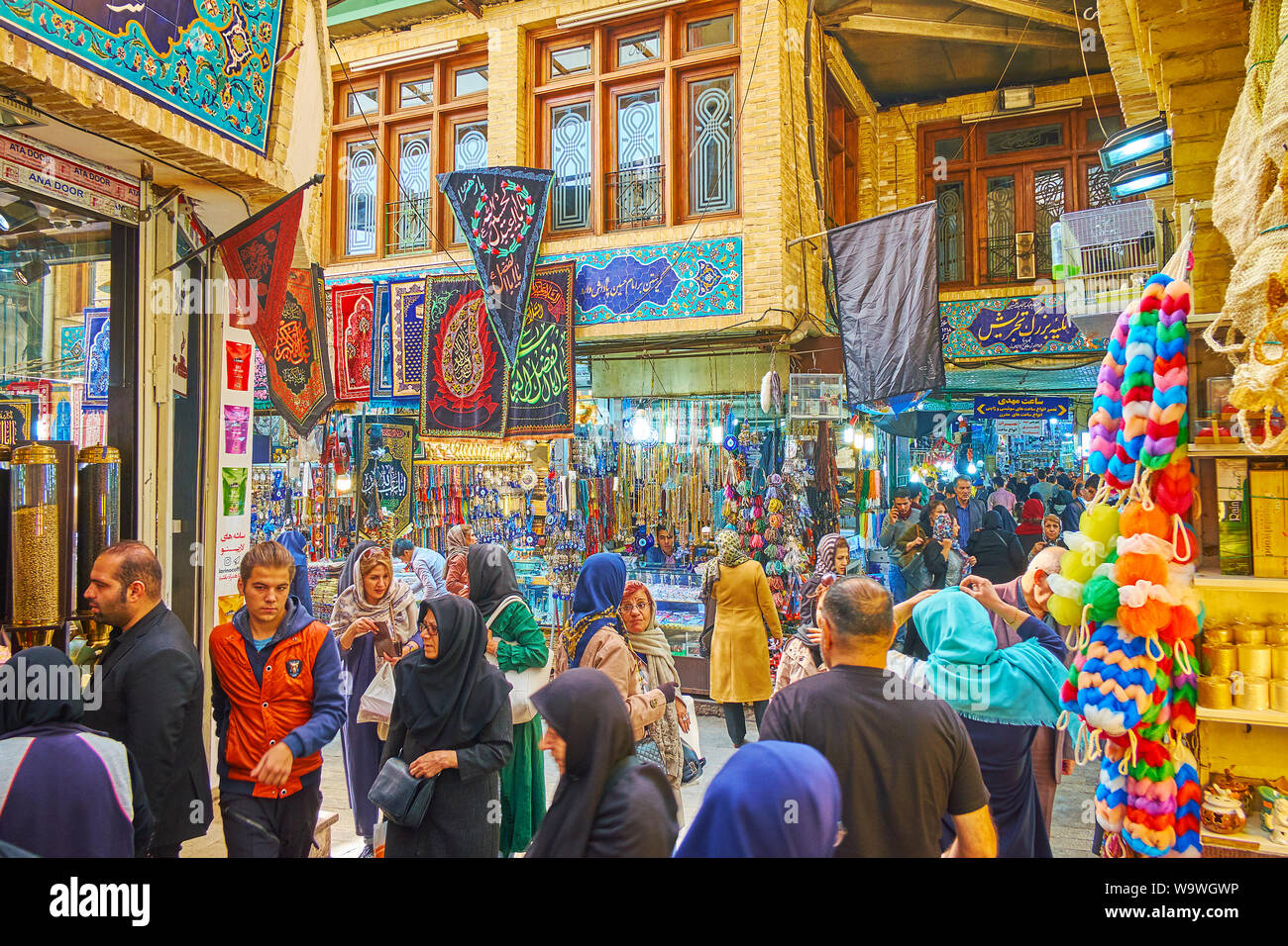 TEHRAN, IRAN - OCTOBER 25, 2017: Curved alleyway of Tajrish Bazaar with ...