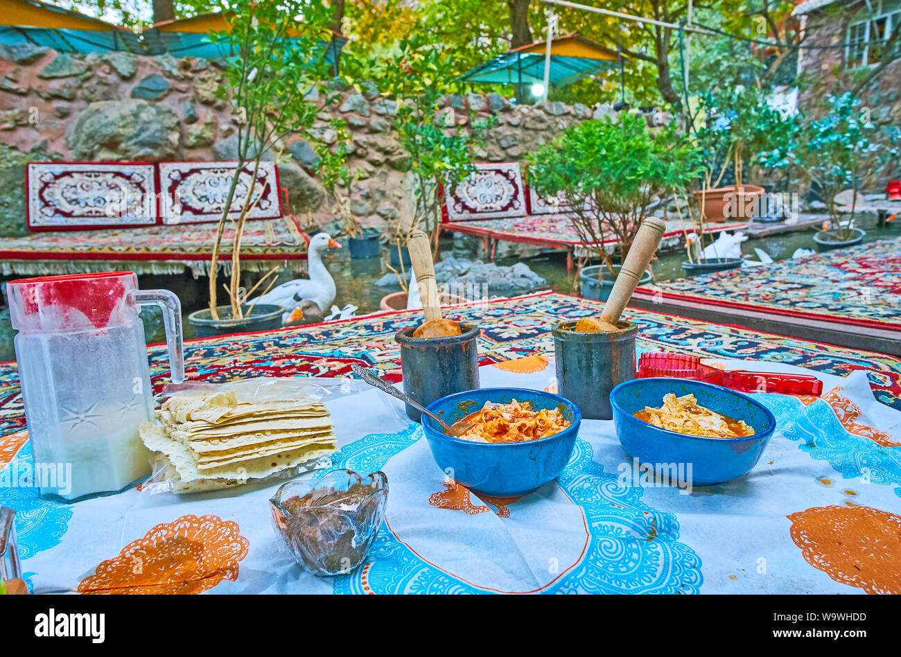 Enjoy traditional dishes in outdoor restaurant of Darband, taste ...