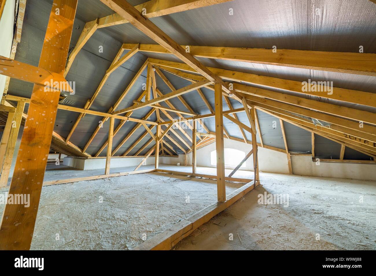 Attic of a building with wooden beams of a roof structure Stock Photo ...