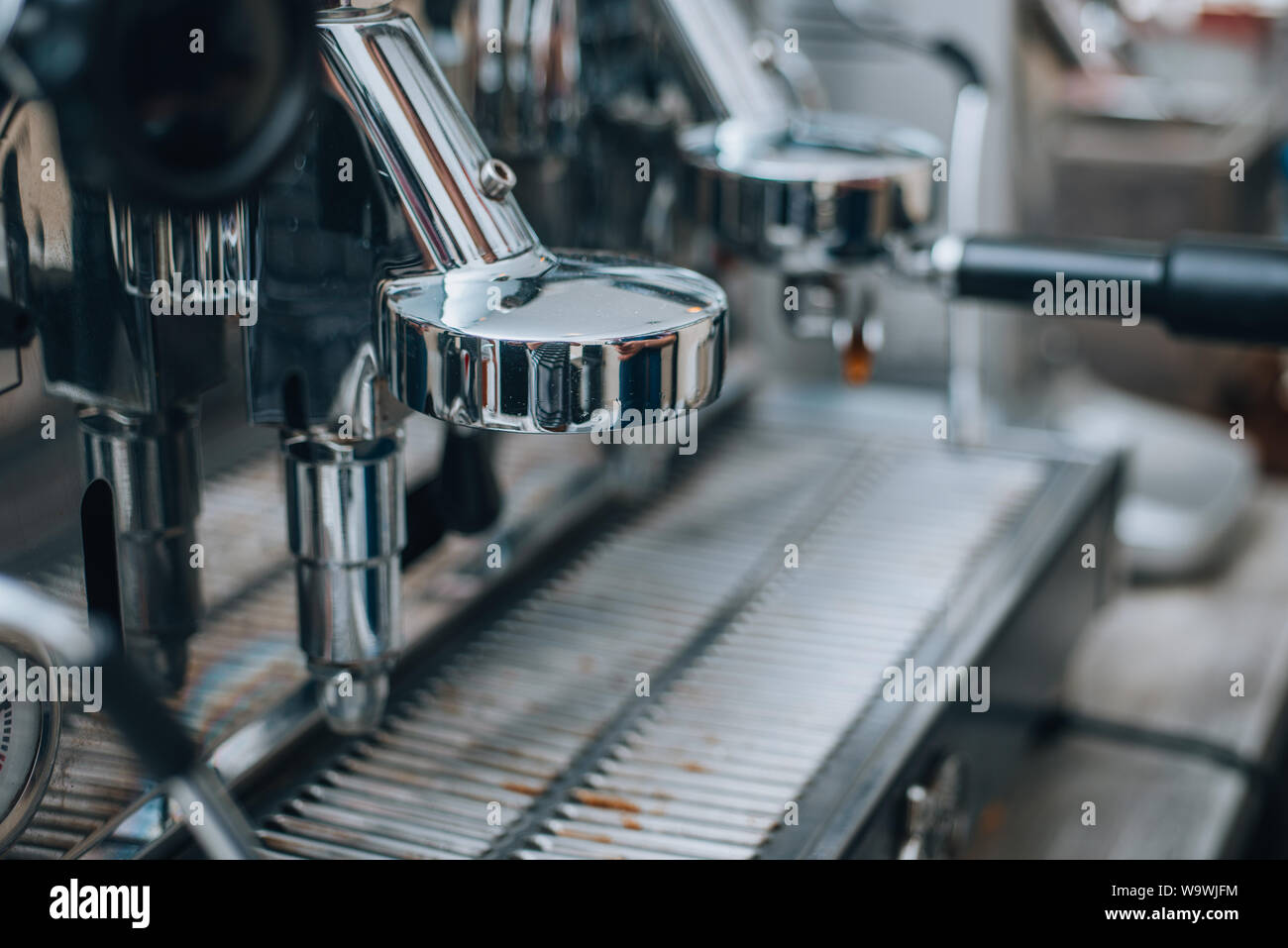 Professional coffee machine with shiny silver filter Stock Photo - Alamy