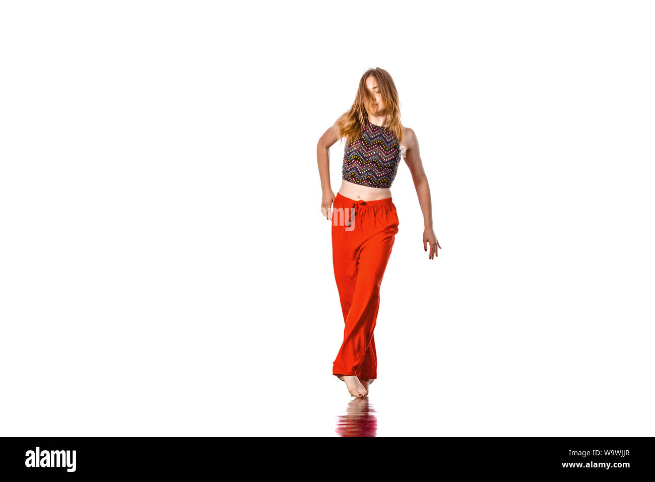 Modern girl doing break dance routine Stock Photo - Alamy