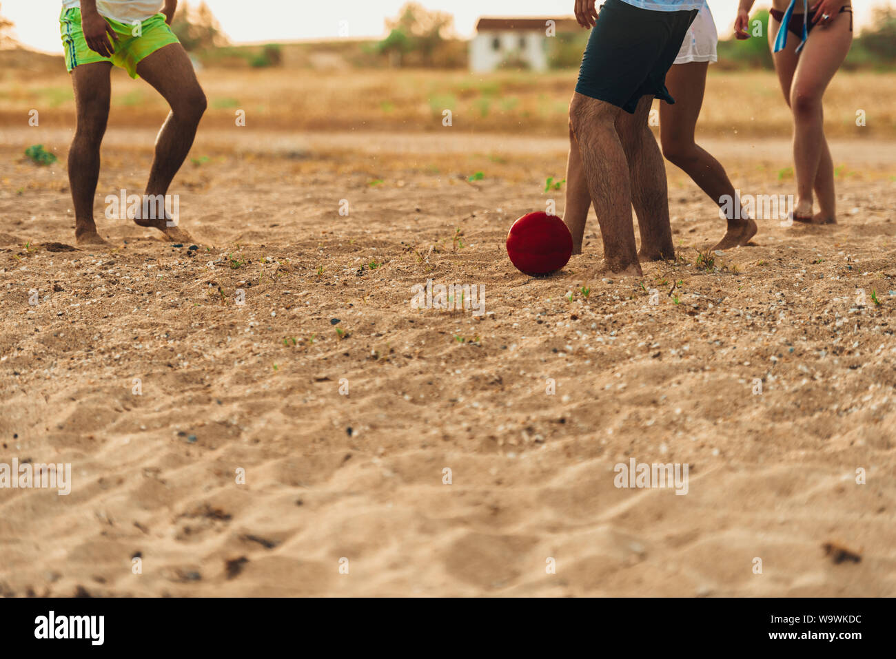 Group of multiracial happy friends having fun with beach sport games ...