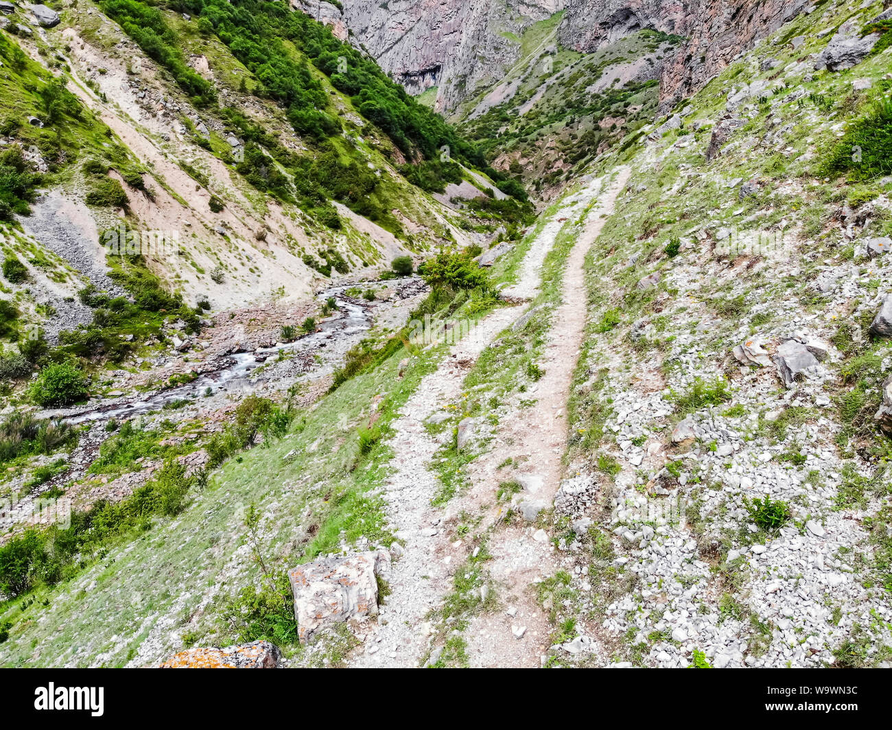 Picturesque landscape with narrow road in summer mountains Stock Photo ...