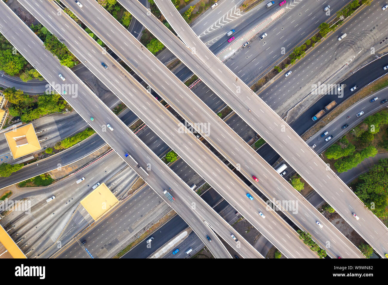 Aerial View Above of Busy Highway Road Junctions at day. The ...