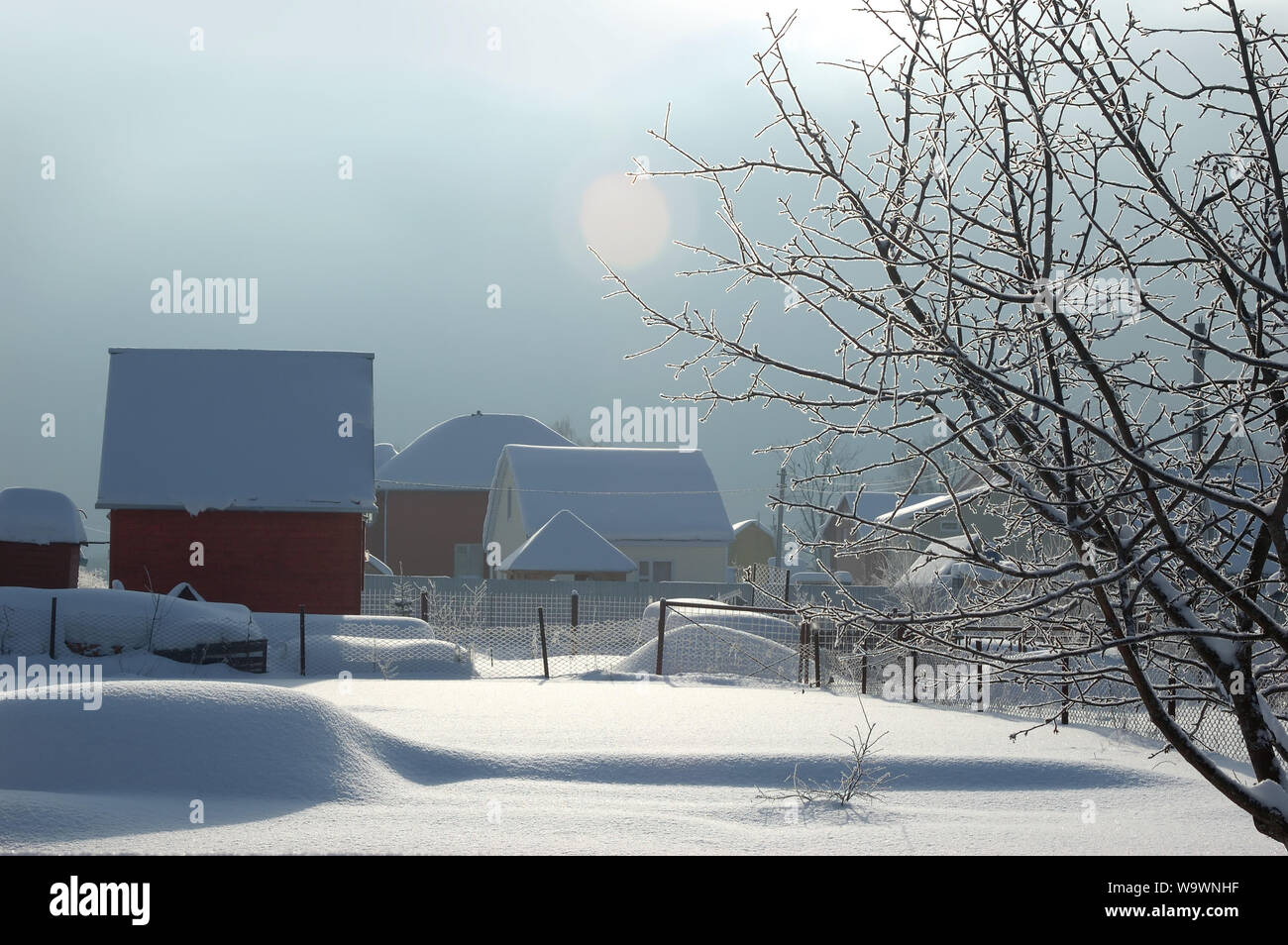 Snow covered suburban village in winter Stock Photo - Alamy