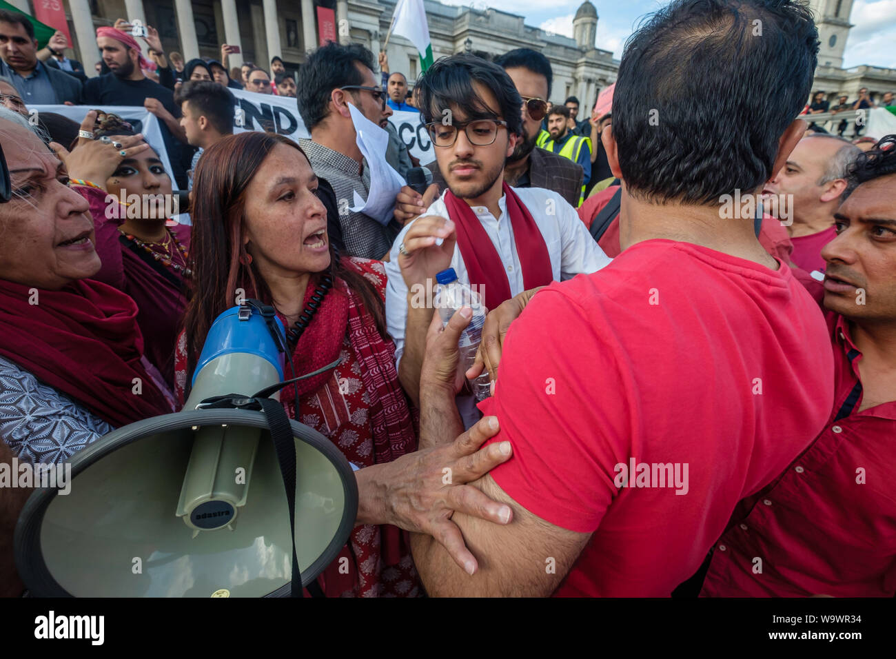London, UK. 15th August 2019. Protesters argue at the protest in ...