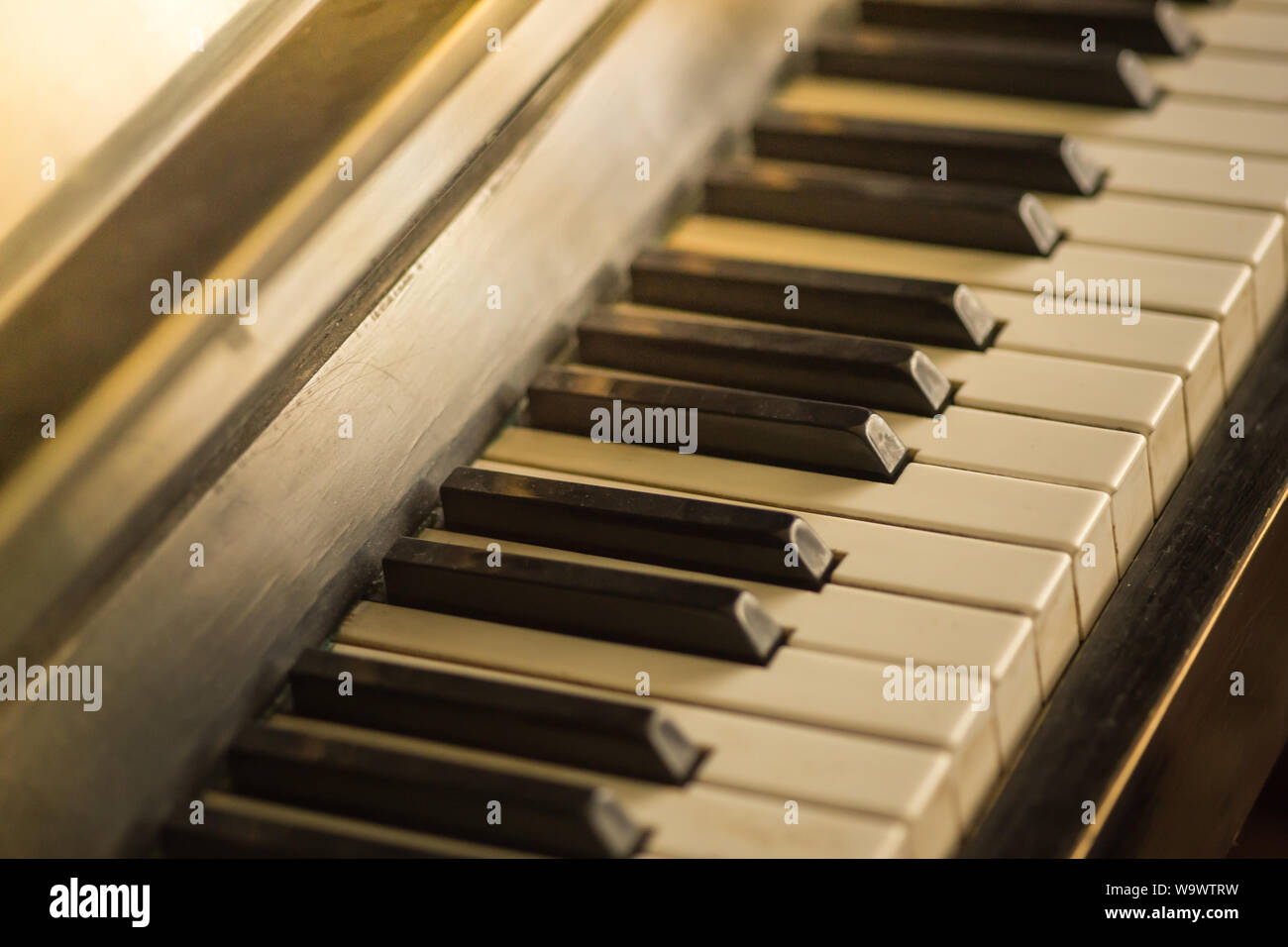 Piano keyboard background with selective focus, warm colors Stock Photo ...