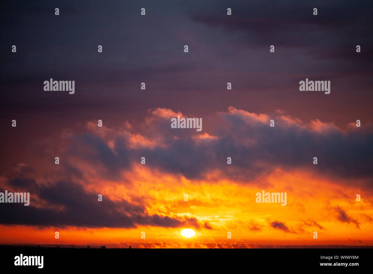 Dramatic sunset with twilight color sky and clouds Stock Photo - Alamy
