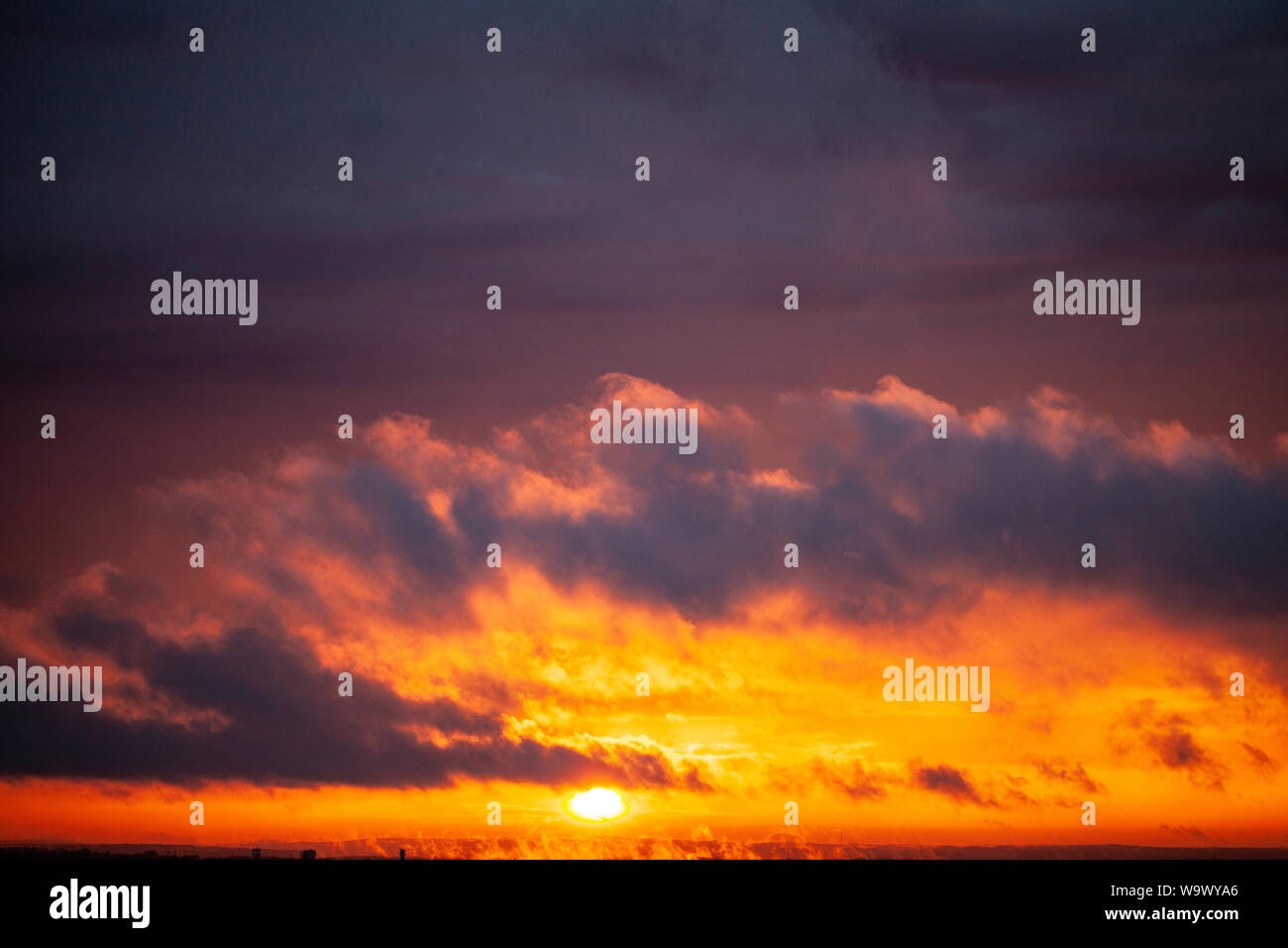 Dramatic sunset with twilight color sky and clouds Stock Photo - Alamy