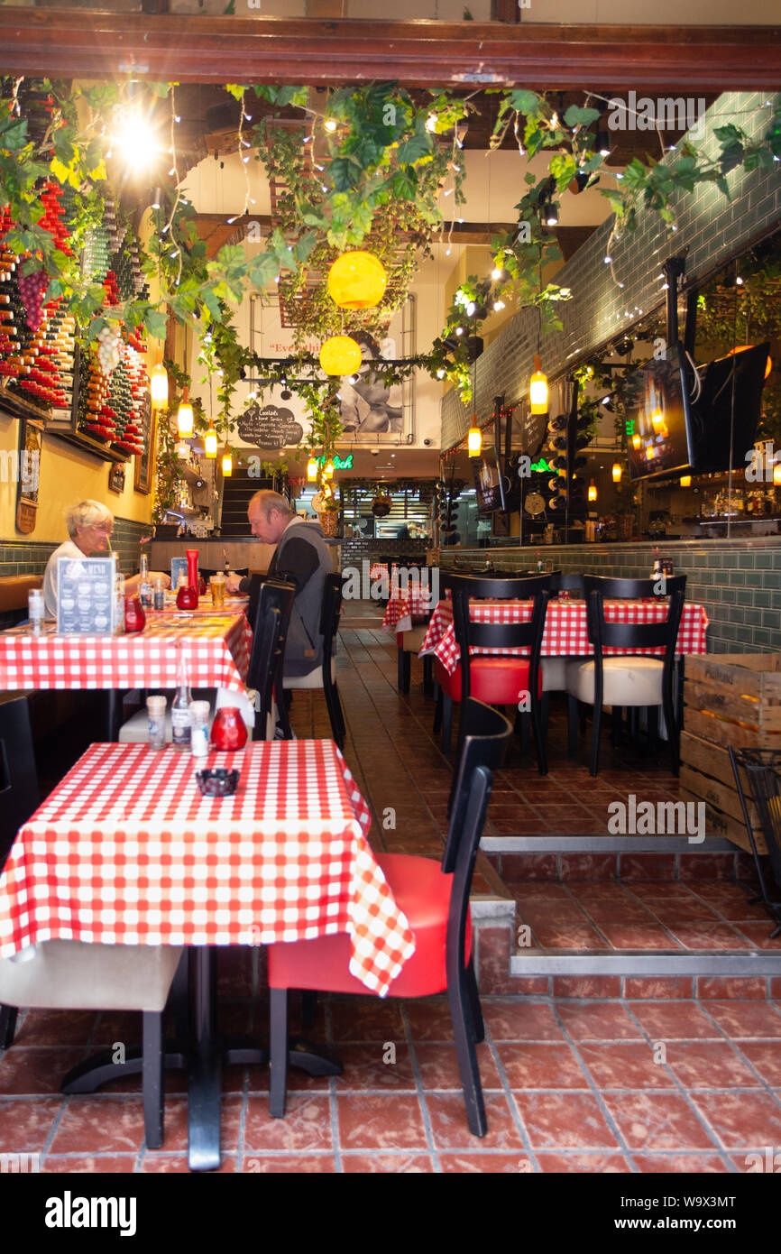 AMSTERDAM, NETHERLANDS - AUGUST 31, 2018: Charming restaurant scene ...