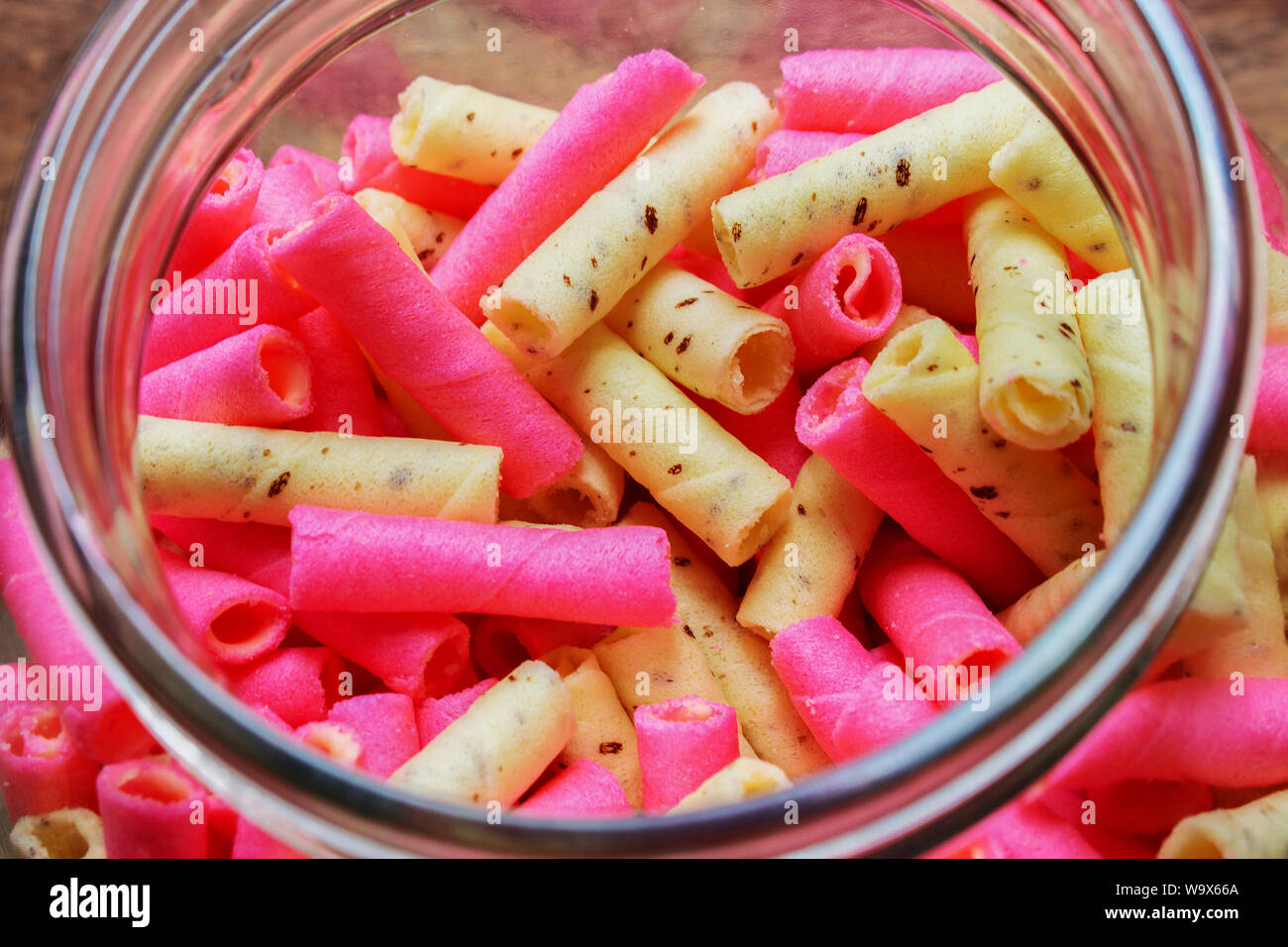 Close Up Red and White Astor Wafer Snacks in Glass Jar Stock Photo - Alamy