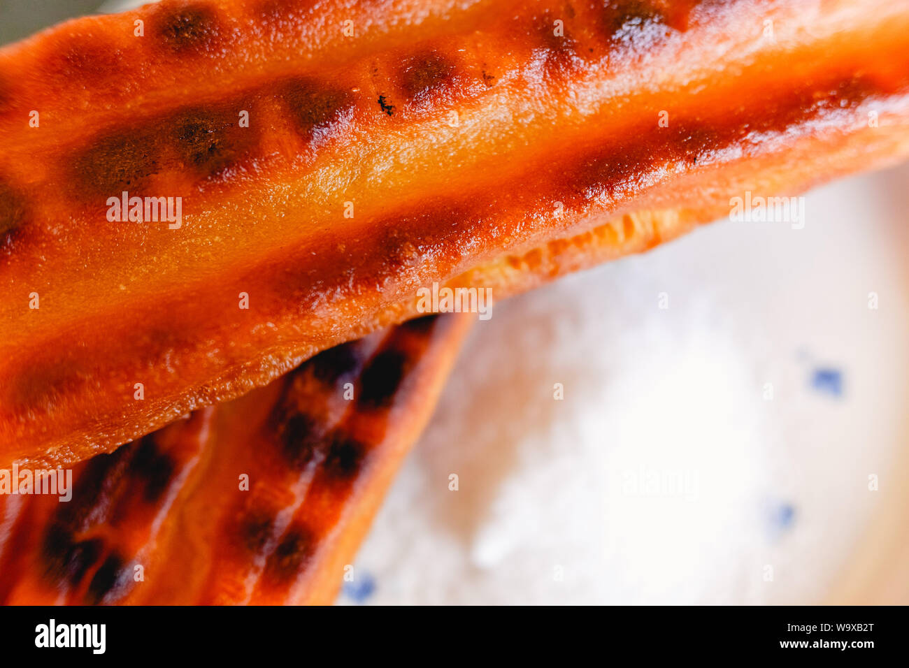 Traditional churro fried in oil for breakfast, made with wheat flour ...