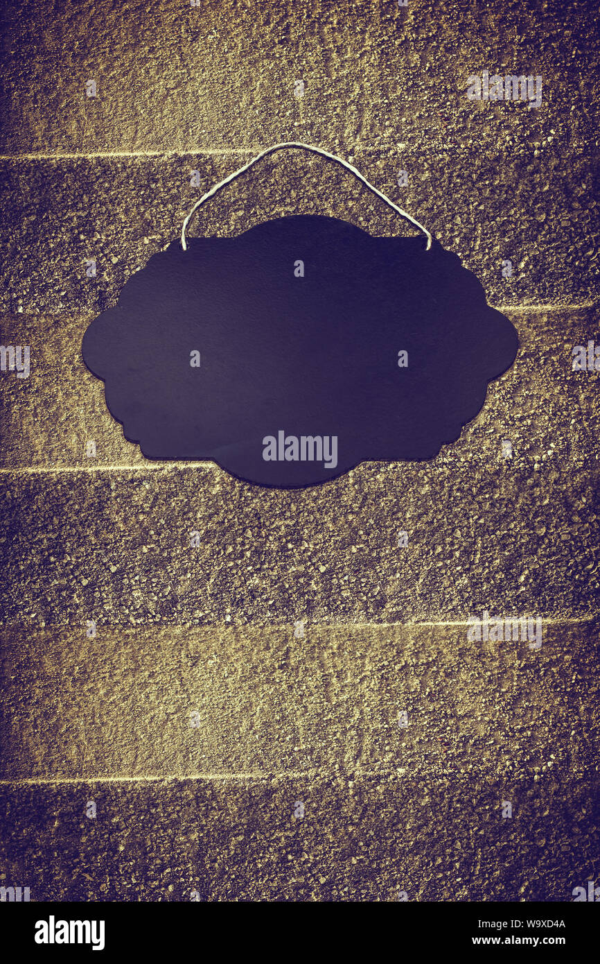 Black Empty Sign Board with string for hanging on wall Stock Photo - Alamy