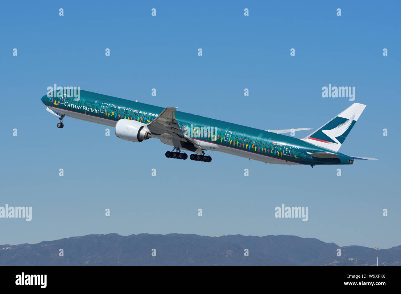 Cathay Pacific jet (Boeing 777) shown departing from LAX, Los Angeles ...