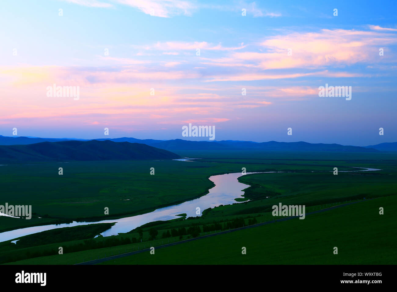 The hulunbuir prairie river of twilight Stock Photo - Alamy