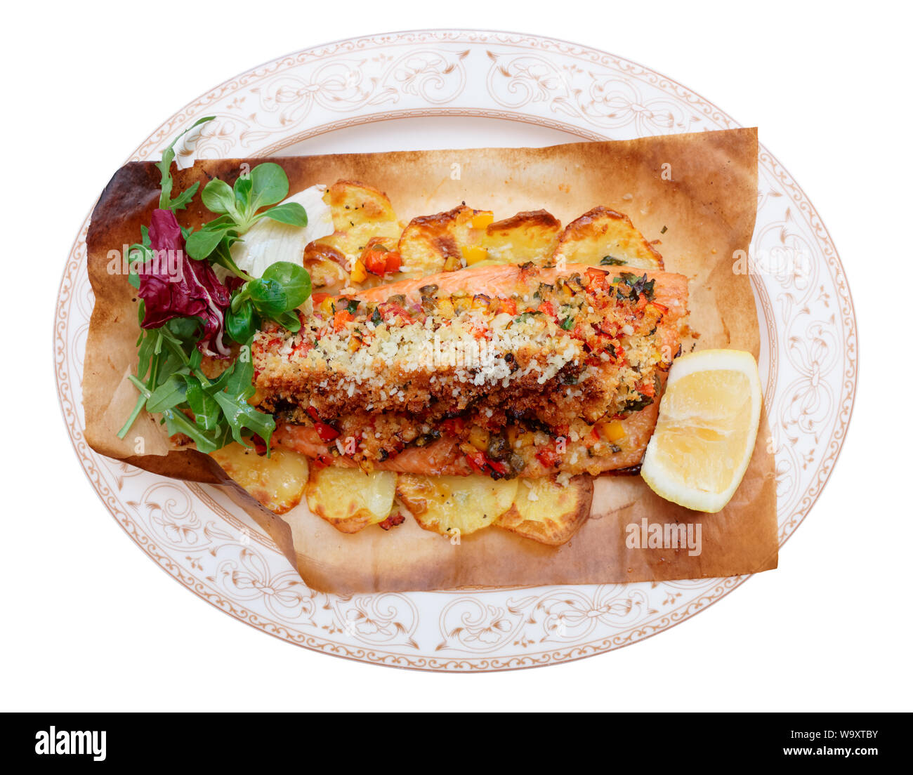 Baked trout with vegetables and bread crumbs, Italian dish, isolated on ...