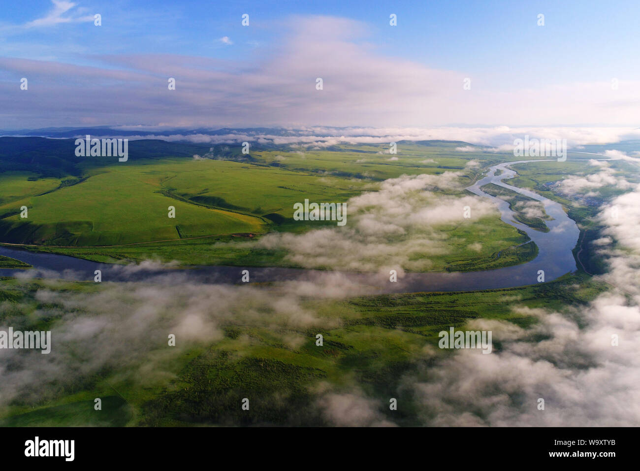 Aerial fog in the bend of the field Stock Photo - Alamy