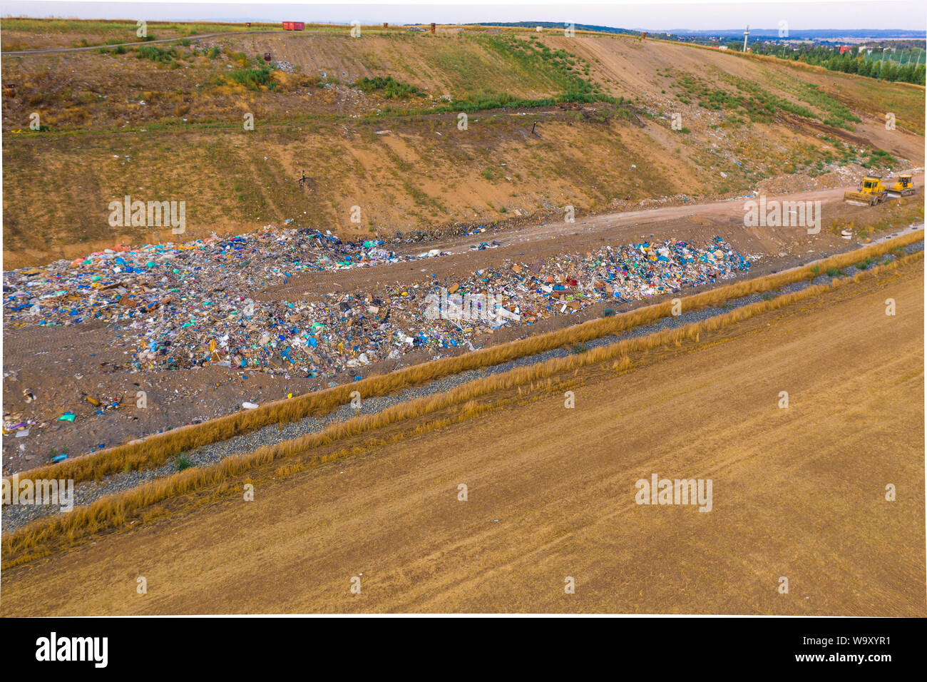 Garbage truck at landfill hi-res stock photography and images - Alamy
