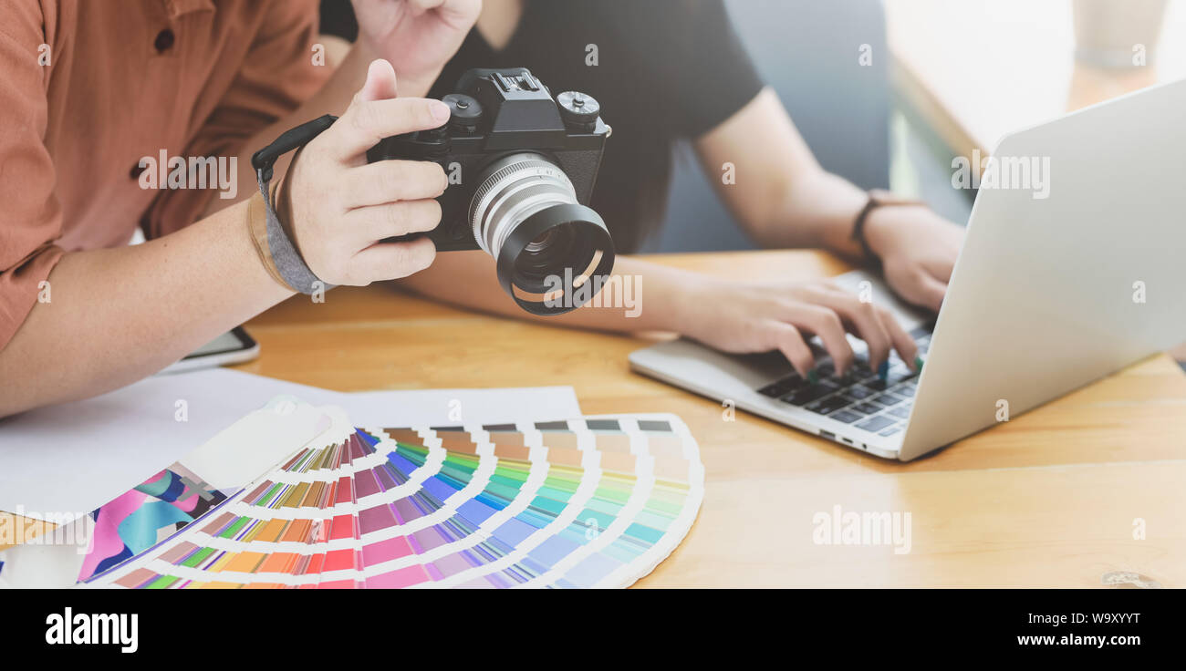 Close-up view of professional graphic designer showing the camera to ...