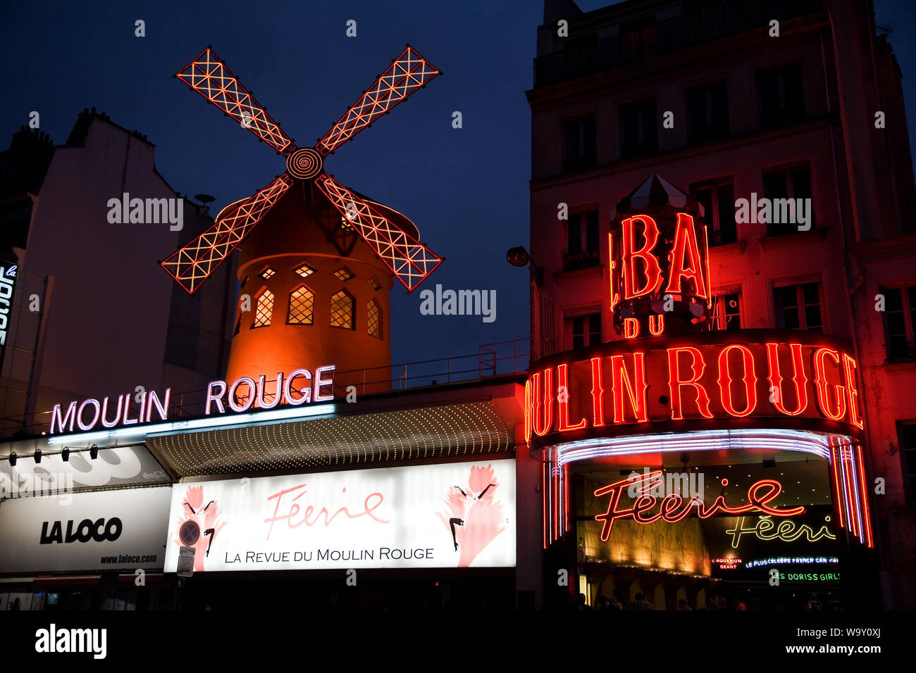 France. Paris. The Moulin Rouge cabaret with its well known windmill is ...