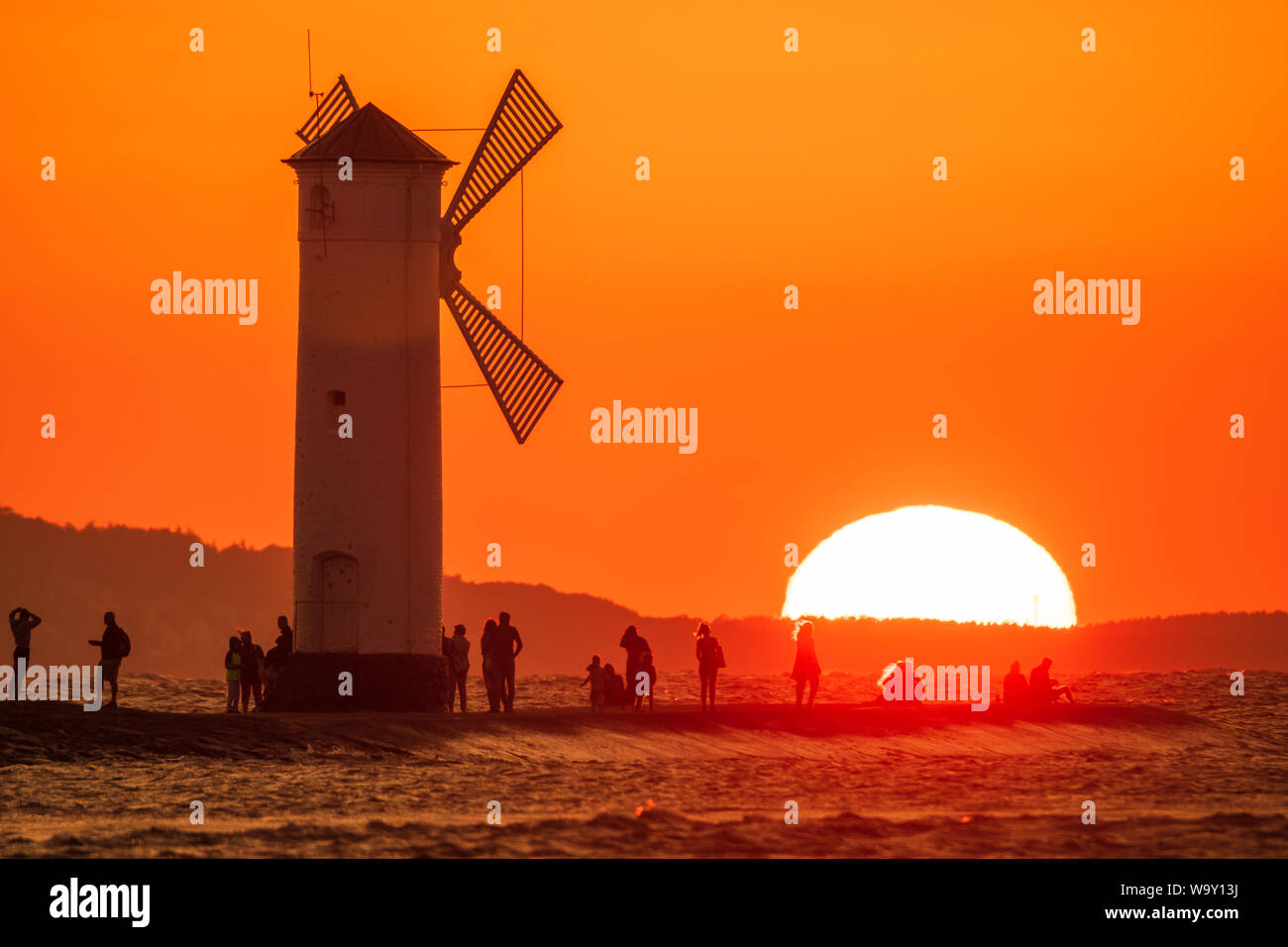 lighthouse in the shape of a windmill in Swinoujscie in Poland during ...