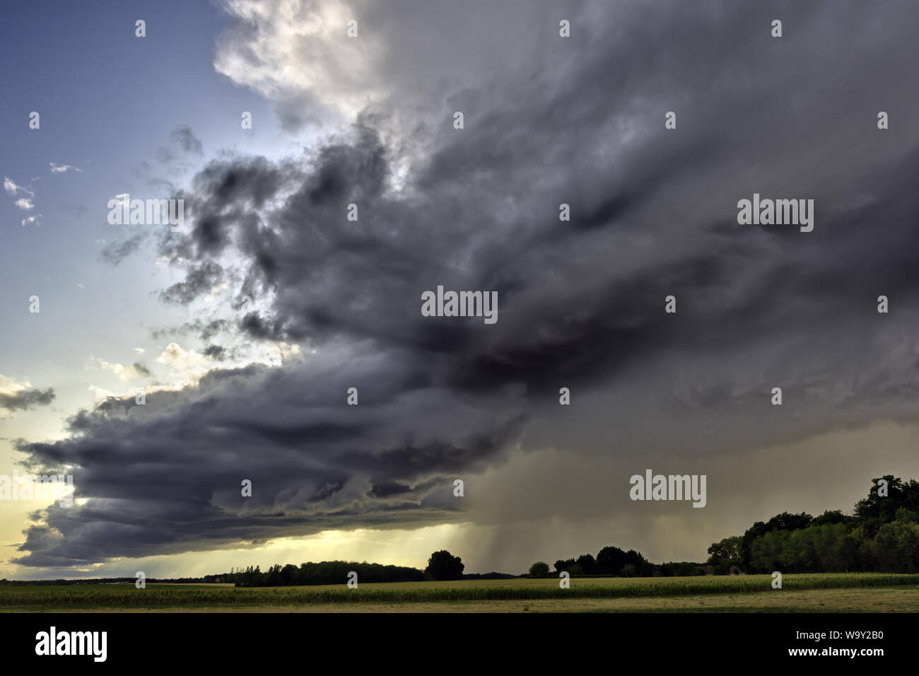 Rainy cloud over meadows hi-res stock photography and images - Alamy