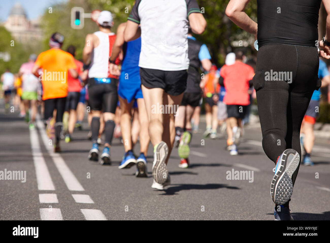 Marathon runners on the street. Healthy lifestyle. Athletes endurance ...