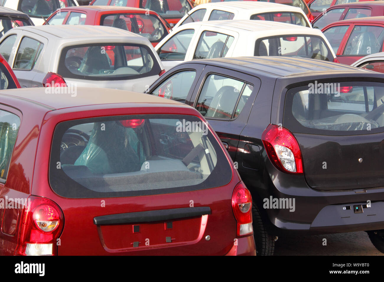 Assorted cars at showroom Stock Photo - Alamy