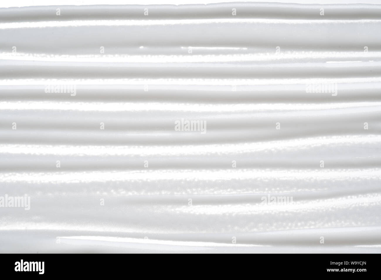 White smear and texture of face cream or acrylic paint isolated on ...