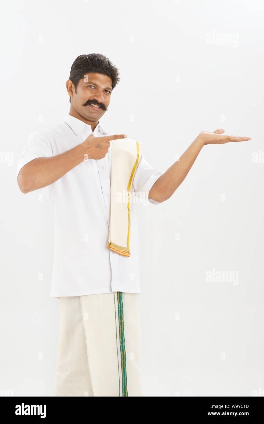 South Indian man arm Outstretched and showing Stock Photo - Alamy
