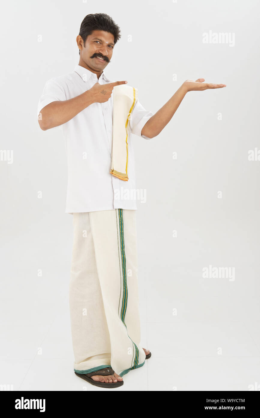 South Indian man arm Outstretched and showing Stock Photo - Alamy