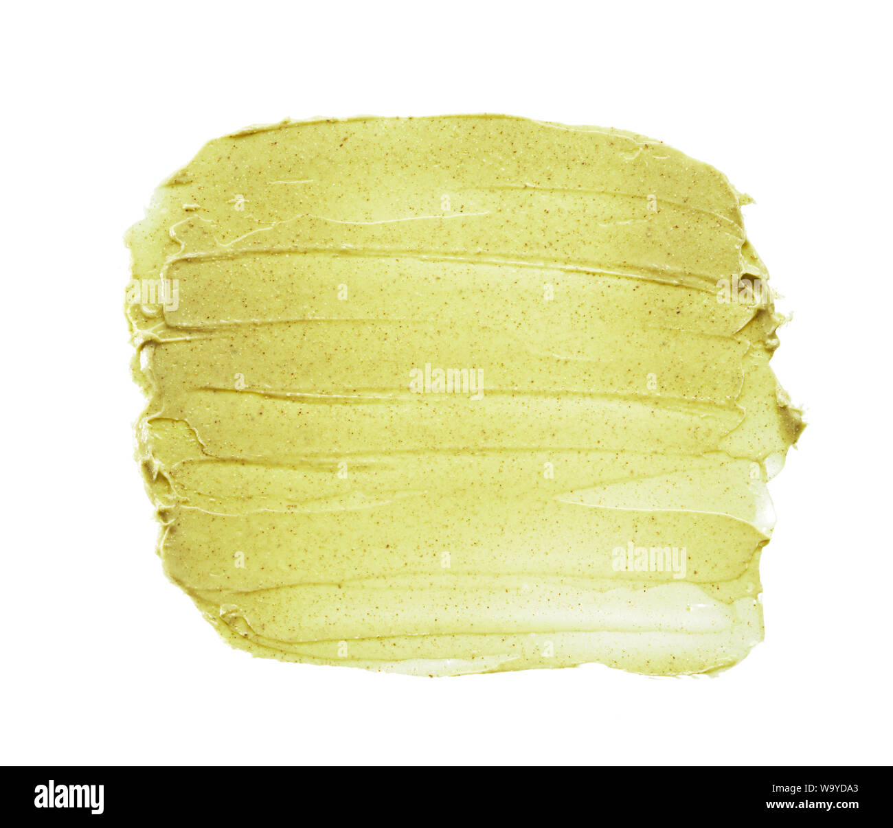 Texture and strokes of a light green organic mask for face or body ...
