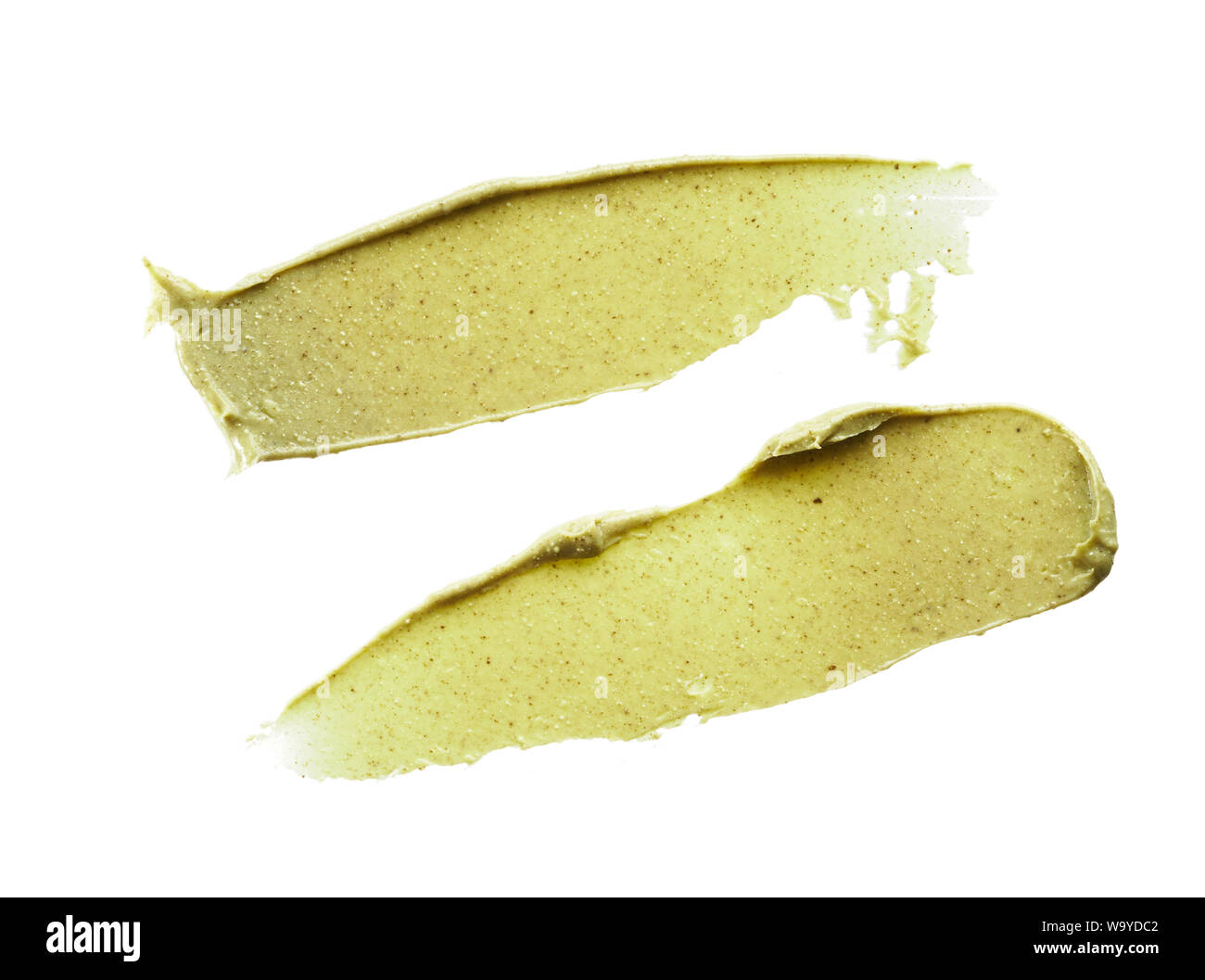 Texture and strokes of a light green organic mask for face or body ...