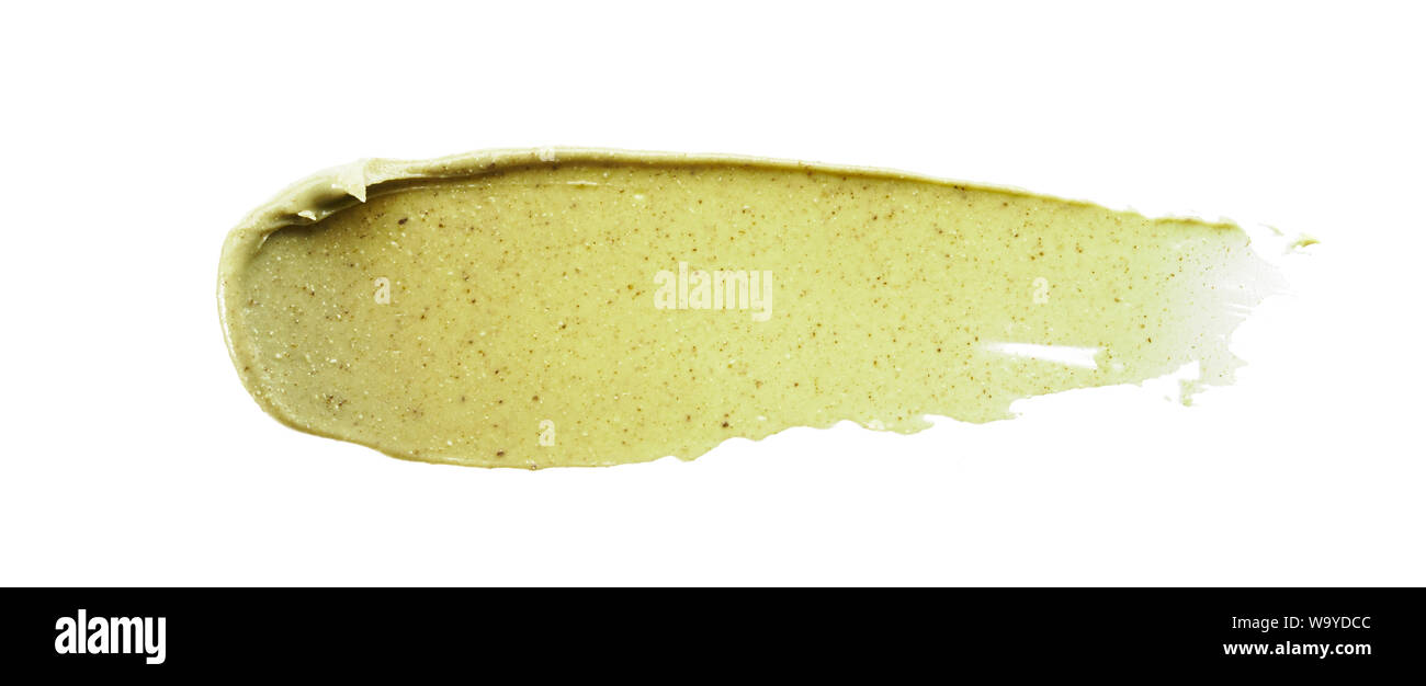 Texture and strokes of a light green organic mask for face or body ...