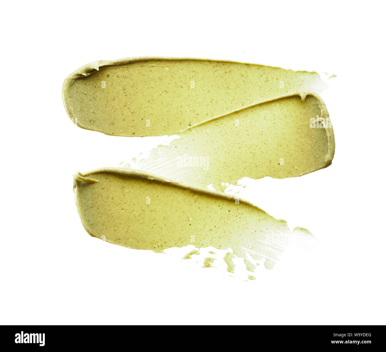 Texture and strokes of a light green organic mask for face or body ...