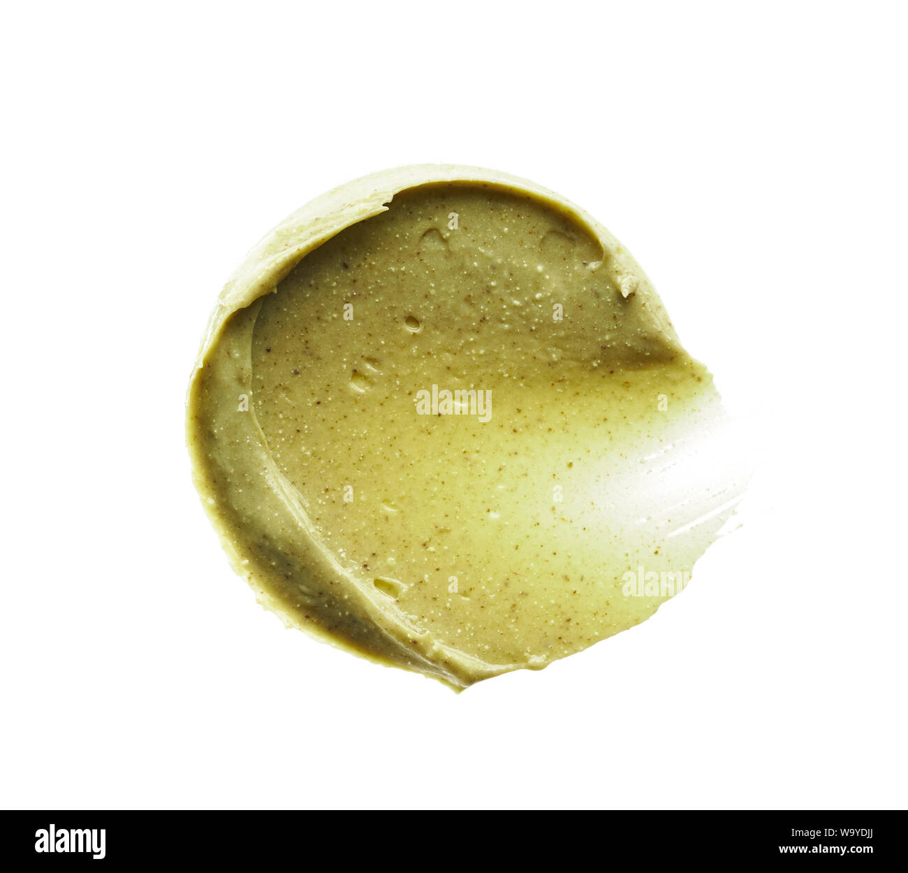 Texture and strokes of a light green organic mask for face or body ...