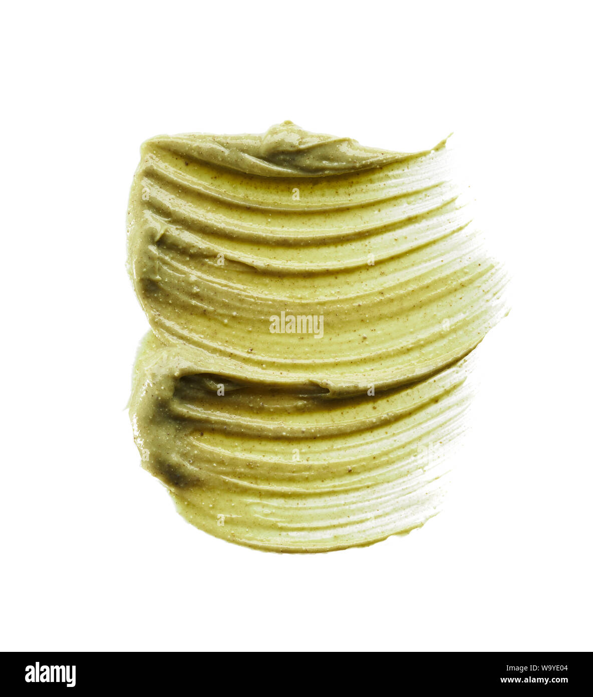 Texture and strokes of a light green organic mask for face or body ...