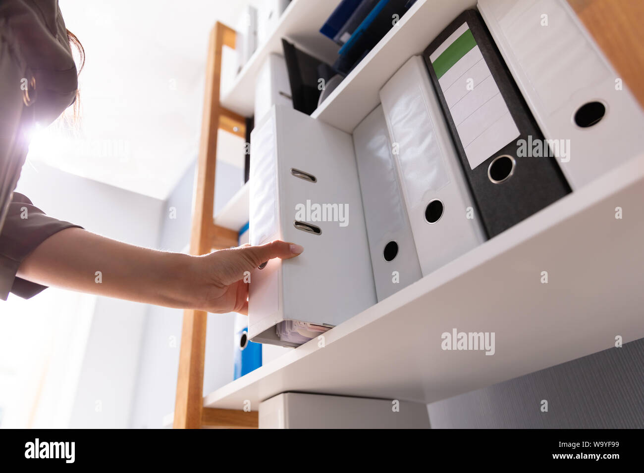 Woman office file taking hi-res stock photography and images - Alamy