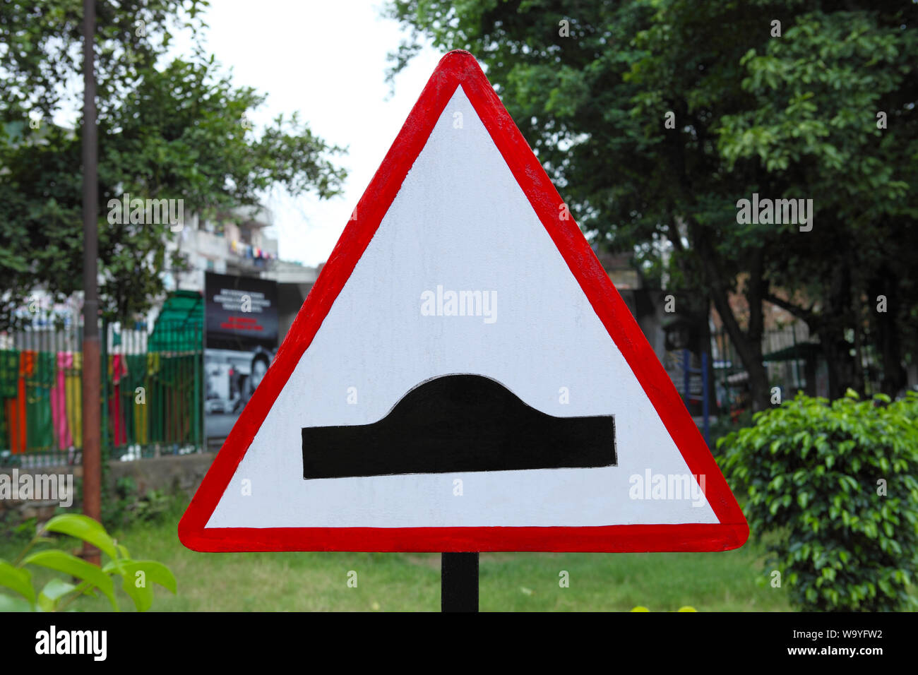 Speed breaker sign hi-res stock photography and images - Alamy