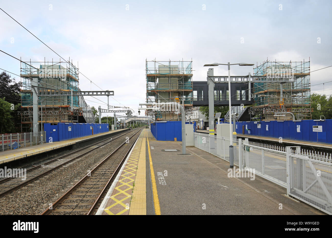 Construction of new pedestrian bridges at an empty Langley railway ...