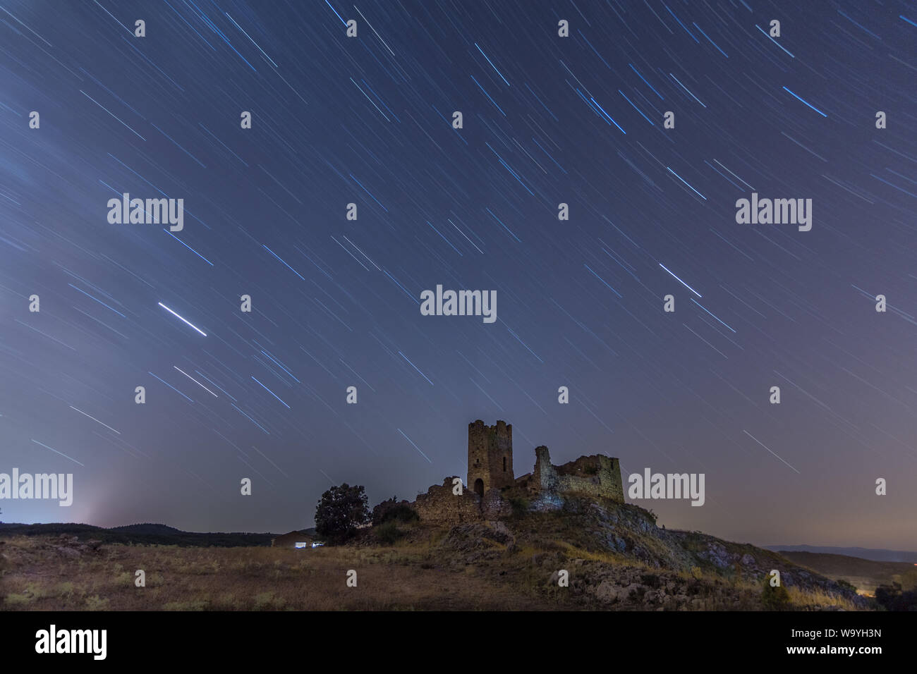 Star trails in a ruined Castle Stock Photo - Alamy